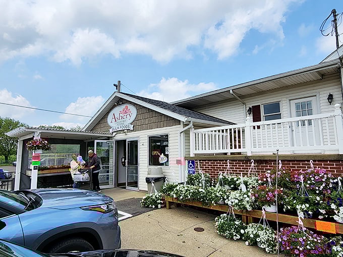 Flowers frame the entrance like nature's welcome committee, inviting you into Amish Country's treasure trove of homemade goodness.