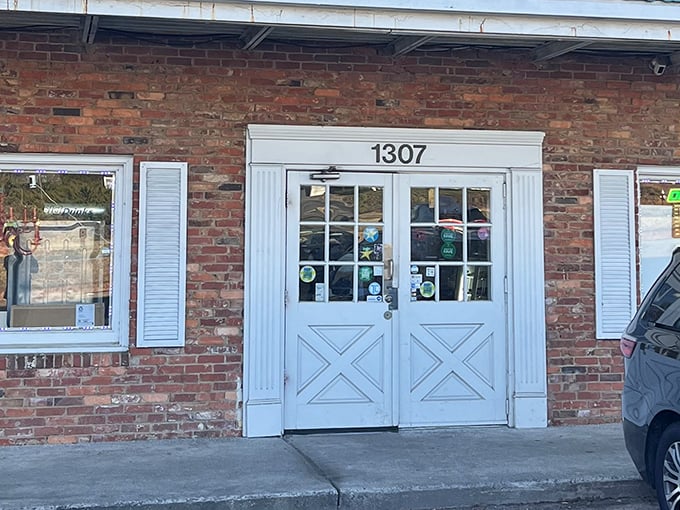 The unassuming white doors of Baker's Dozen hide a world of donut magic. Sometimes the best treasures come in the plainest packages!