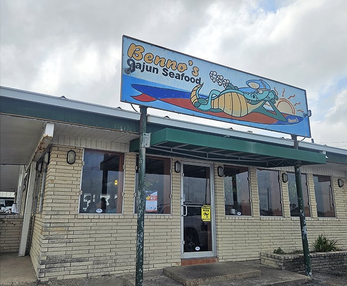 Benno's colorful sign promises Cajun seafood treasures just steps from Galveston's waves. The perfect beach-day destination!