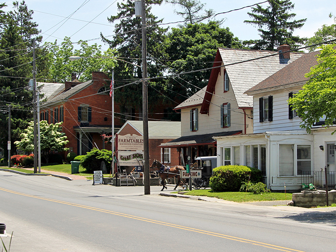 Main Street charm in Bird-in-Hand, where horse-drawn buggies and homemade pies are just another Tuesday morning.
