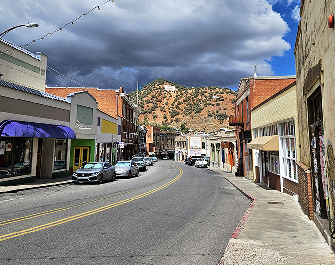 Main Street Bisbee winds through colorful hillside buildings like a rainbow decided to settle down permanently.