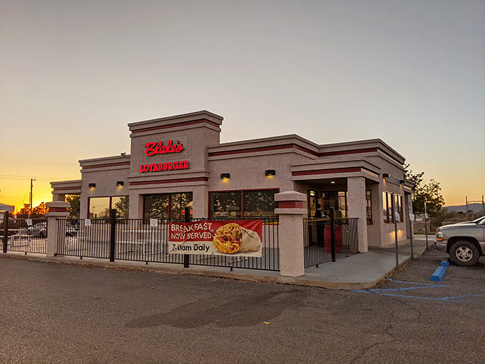 Blake's Lotaburger stands proud against the sunset, like a burger beacon calling hungry travelers home.