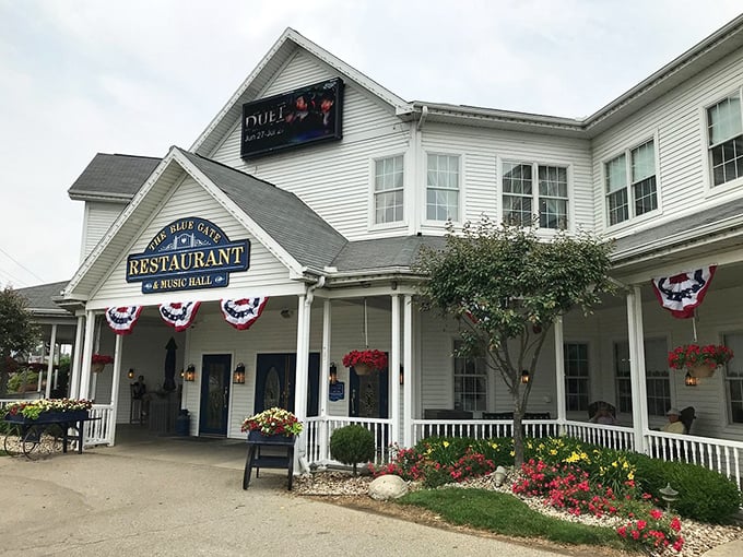 The Blue Gate welcomes you like an old friend, with its white clapboard charm and patriotic bunting promising comfort food that hugs your soul.