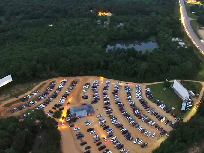 Aerial magic! The Blue Moon Drive-In transforms an ordinary field into a constellation of cars under the Alabama twilight.
