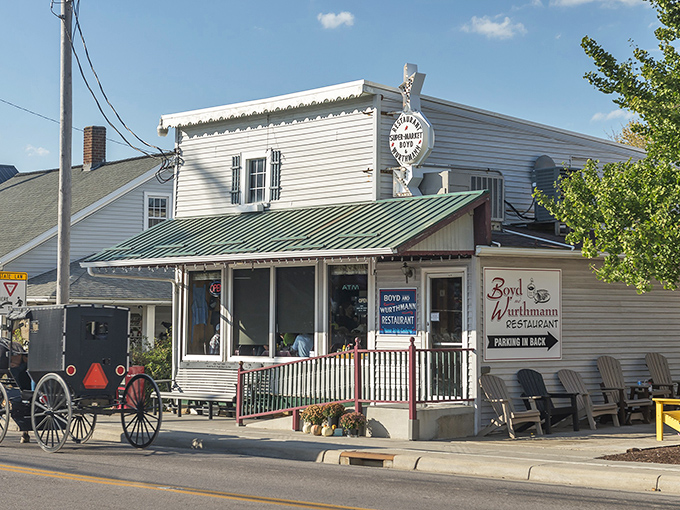 This charming white building with its welcoming porch whispers "come on in, we've got comfort food waiting."
