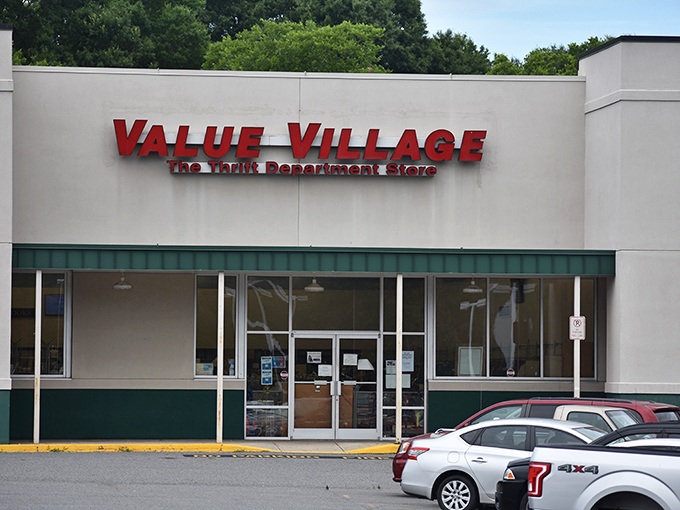 Value Village's bold red sign promises treasure hunting adventures. Like a department store, but with better stories behind each item!