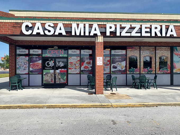 Sometimes the best treasures hide behind the most ordinary brick facades and simple green chairs.