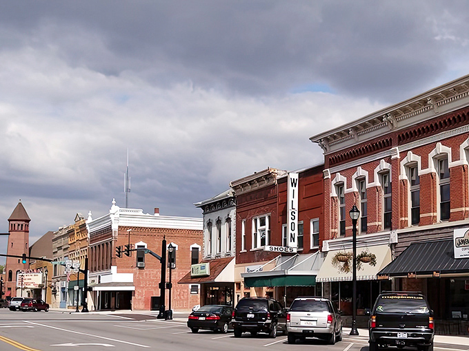 Main Street magic happens here – where red brick buildings tell stories and every storefront feels like home.
