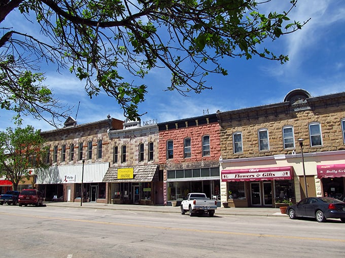 Classic storefronts line up like old friends sharing stories under Nebraska's endless blue sky.