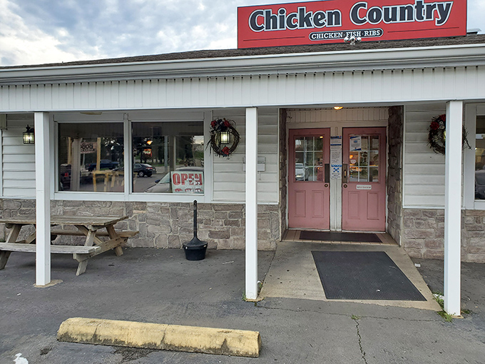 The welcoming facade of Chicken Country beckons like an old friend promising comfort in crispy, golden form.