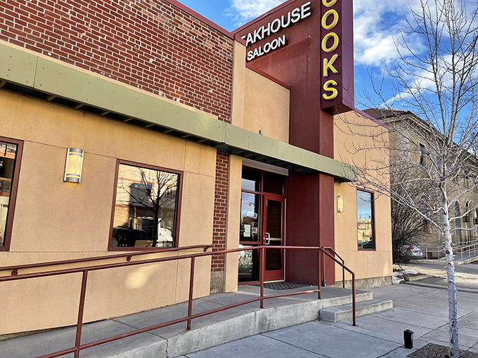 That brick facade whispers "serious steaks inside" - sometimes the best treasures hide behind unassuming doors.