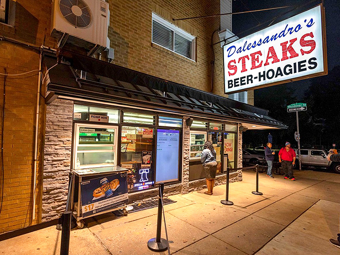 The neon sign beckons like an old friend. This corner spot has been making Philly dreams come true, one sizzling sandwich at a time.
