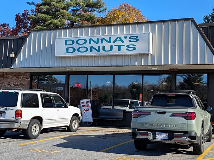 Donna's Donuts exterior beckons with its no-frills turquoise sign &ndash; proof that the best donuts don't need fancy packaging, just perfect execution.