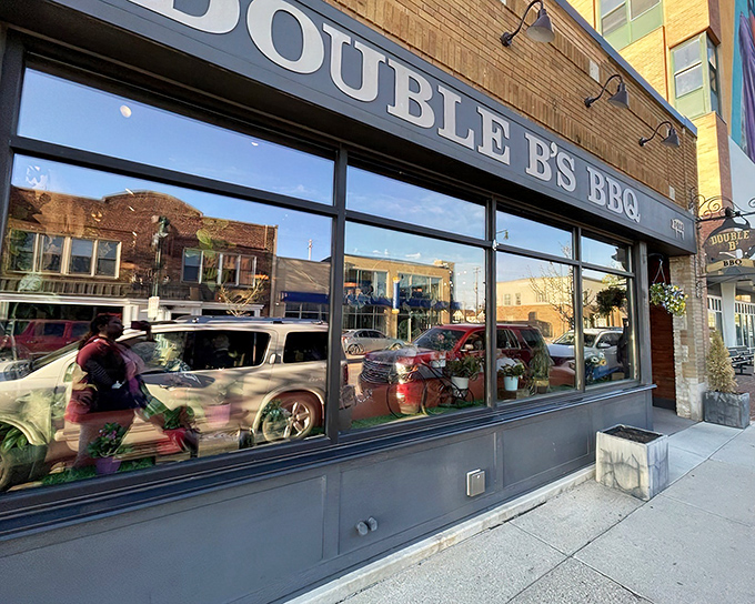 Double B's storefront beckons with urban charm &ndash; a brick facade hiding smoky treasures waiting to be discovered inside.