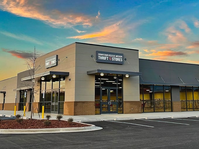 The Downtown Rescue Mission Thrift Store gleams like a bargain beacon at sunset. Shopping with purpose never looked so inviting!