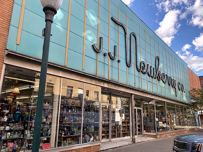 The iconic turquoise facade of J.J. Newberry Co. isn't just nostalgic eye candy—it's a time portal disguised as an antique store!