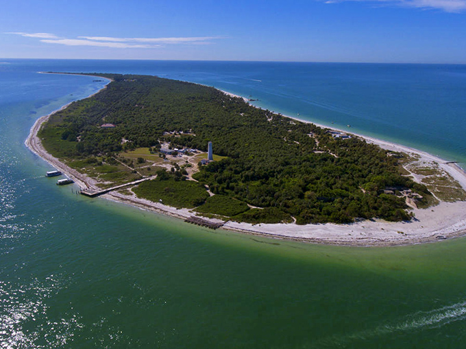 Egmont Key from above &ndash; nature's perfect horseshoe of paradise, where dolphins play and history sleeps beneath the palms.