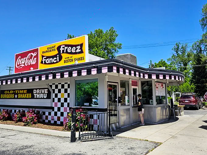 Fanci Freez's black and white checkerboard pattern is the chess board where hot dogs make their winning move against your hunger.