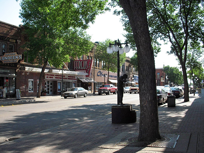 Classic small-town charm meets budget-friendly living on these tree-lined streets where every dollar stretches like Sunday afternoon shadows.