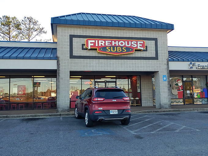 That blue roof beckons like a lighthouse for sandwich lovers seeking their next great meal adventure.