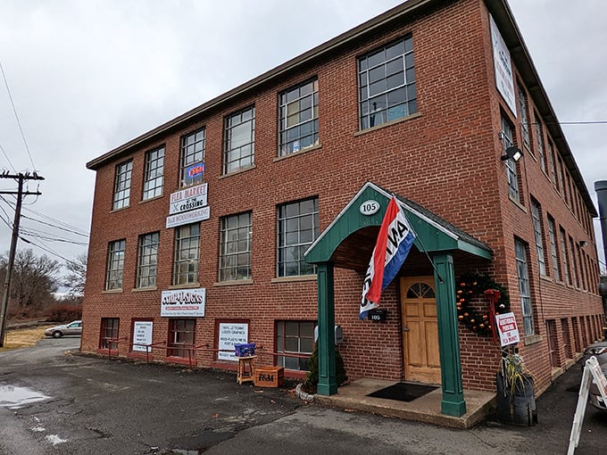 That classic brick building holds treasures inside—your next favorite find waits behind those green awnings and wooden doors.