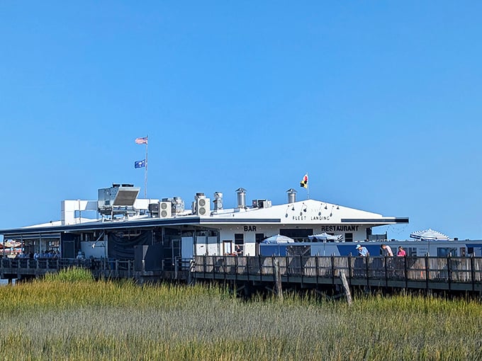 Perched like a maritime fortress over Charleston Harbor, this waterfront dining destination commands attention with weathered charm.