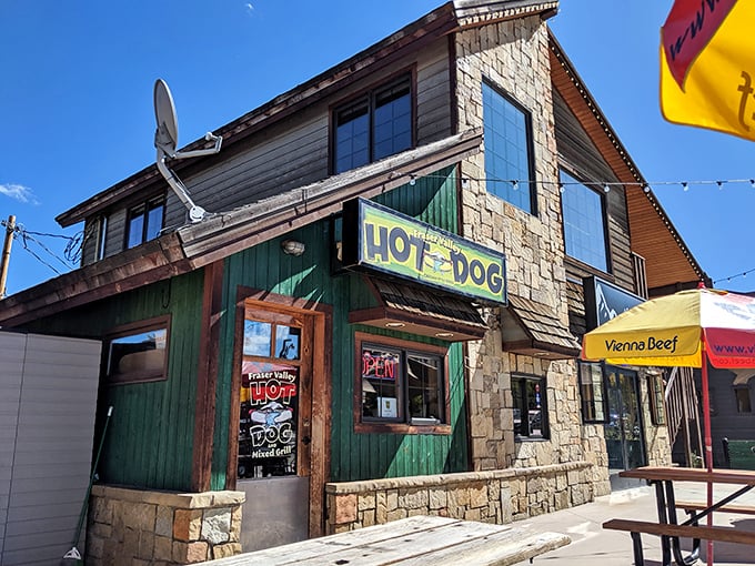 The rustic charm of Fraser Valley Hot Dog's stone-and-timber exterior promises mountain-sized flavor in a postcard-perfect setting.