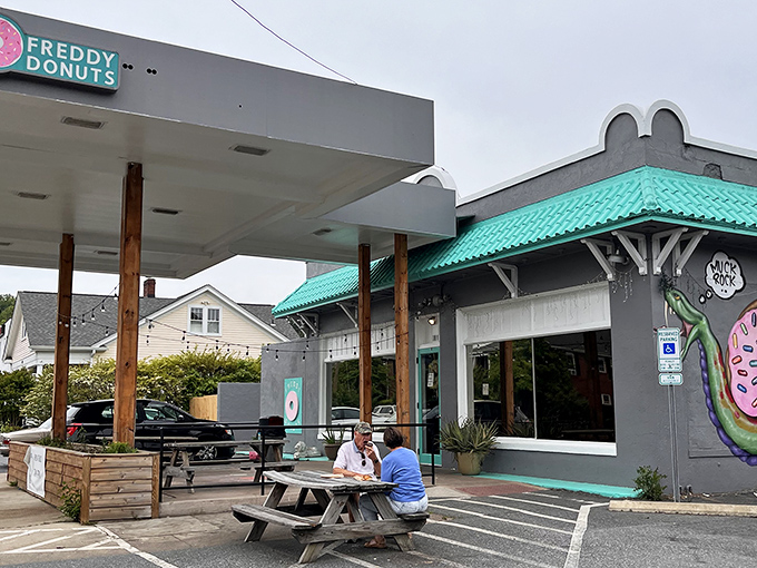 Freddy Donuts has transformed this old gas station into a donut paradise. That teal roof signals sweet treasures await inside!