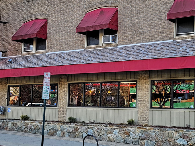 That classic red awning beckoning like a pizza lighthouse - some traditions never go out of style.