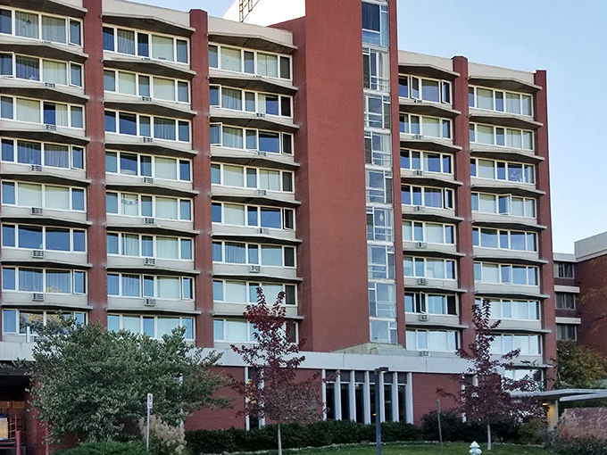 Golden West's red brick facade stands proud like a reliable friend who's always there for you.