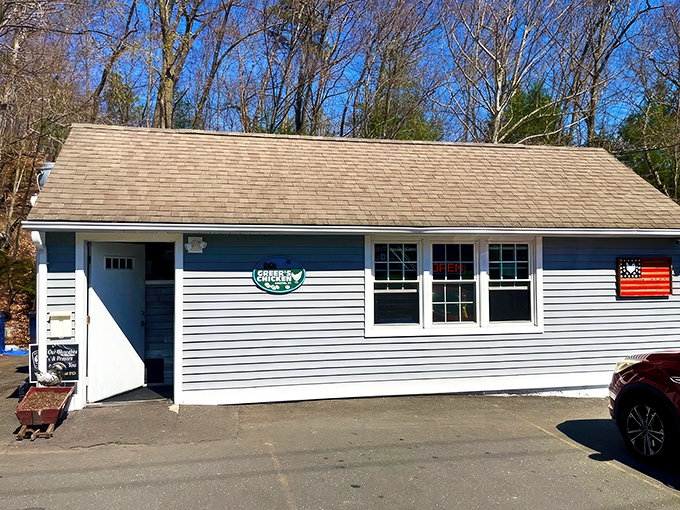The unassuming exterior of Greer's Chicken in Bristol - proof that culinary treasures often hide in the most modest packages.