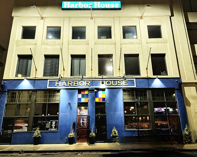 Harbor House's vibrant blue exterior and colorful windows light up Detroit's nightlife scene like an underwater disco.