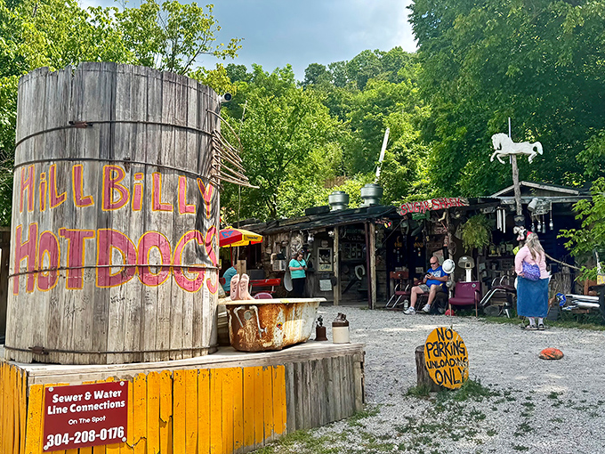 The giant wooden barrel outside Hillbilly Hot Dogs screams "roadside adventure" louder than your GPS when you miss a turn!
