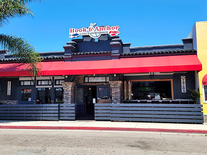 Hook & Anchor's inviting storefront promises seafood treasures within. That red awning is like a beacon for lobster lovers!