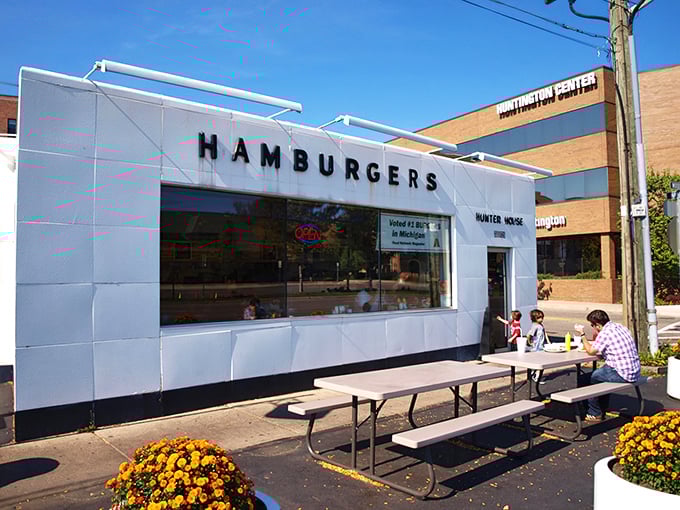 This unassuming white building proves that great burgers don't need fancy architecture to steal your heart.