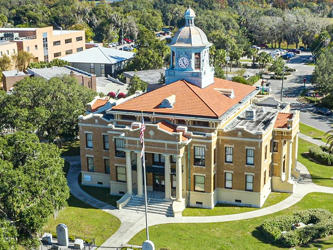 This building stands proud like a Southern belle at her debutante ball, complete with that classic dome that says "small-town charm."