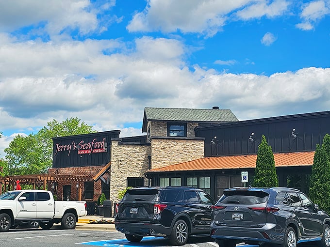 Jerry's Seafood exterior beckons with its stone-and-brick charm. The "Home of the Crab Bomb" isn't just a tagline&mdash;it's a delicious promise.