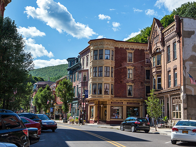 Jim Thorpe's Victorian skyline looks like a movie set, with colorful brick buildings nestled against the mountain backdrop.