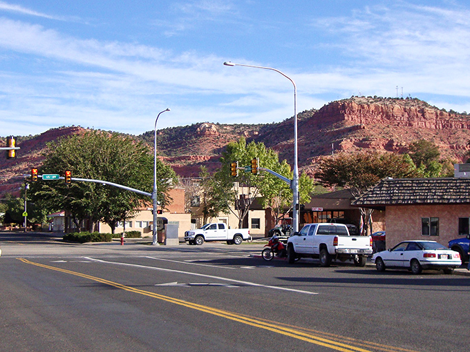 Main Street Kanab stretches out beneath towering red cliffs that make every day feel like a western movie premiere.