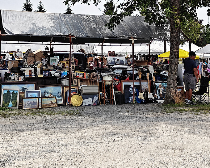 Treasure hunter's paradise! Tables overflowing with vintage frames, furniture, and knick-knacks create a maze of possibilities at Londonderry Flea Market.