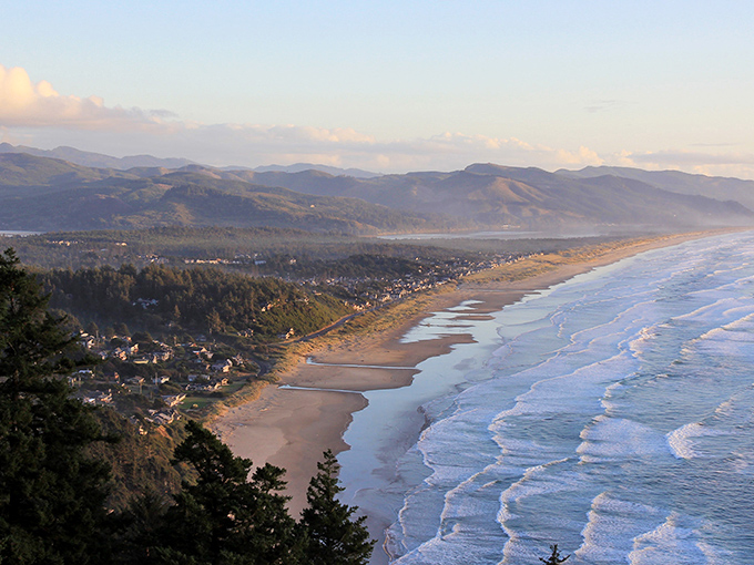 Golden hour transforms Manzanita into a postcard-perfect scene where mountains kiss the endless Pacific coastline.