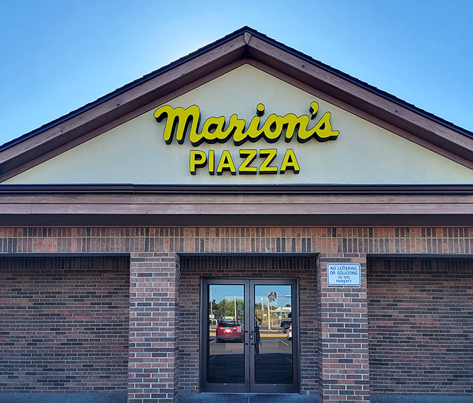 The iconic yellow Marion's Piazza sign - a beacon of hope for the thin-crust-deprived souls of Dayton since forever.