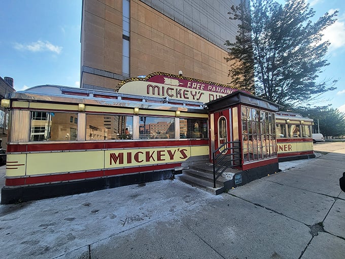 The iconic red and yellow dining car of Mickey's Diner glows like a beacon of hope for hungry night owls in downtown St. Paul.