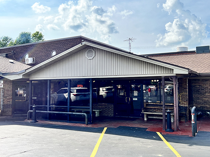 The unassuming exterior of Moonlite Bar-B-Q Inn hides a smoky paradise within. Like finding a treasure map in your attic!
