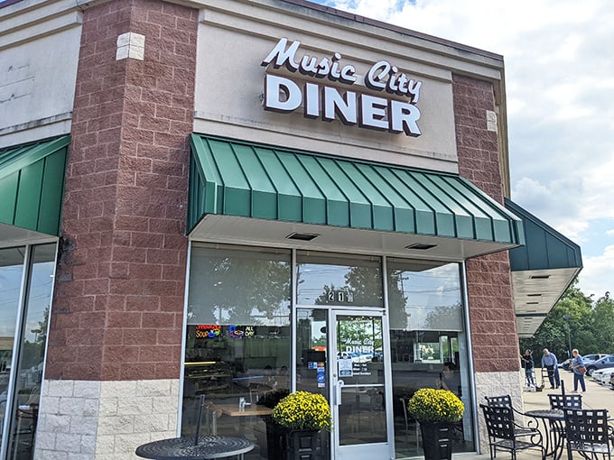 Music City Diner's brick exterior with green awnings promises comfort food that hits all the right notes in Hendersonville.