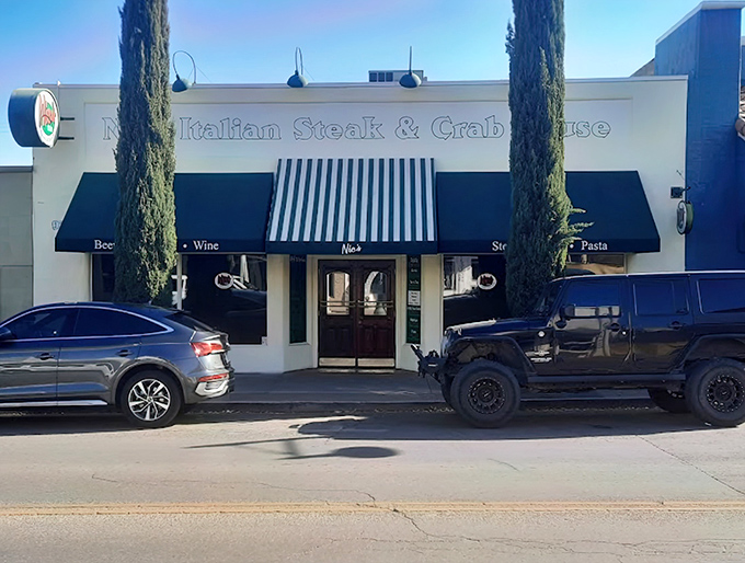 Nic's Italian Steak & Crab House: Classic elegance with tall cypress trees flanking the entrance&mdash;like finding a slice of Tuscany in the Arizona desert.