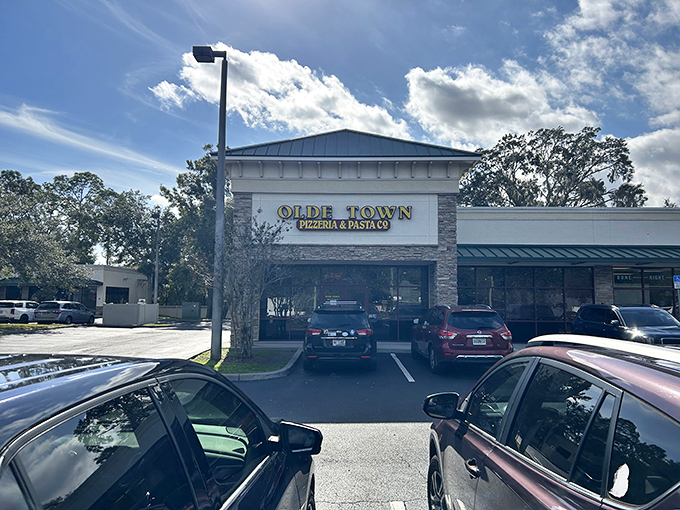 Don't judge this book by its strip mall cover! Olde Town Pizzeria hides behind a modest facade, but inside awaits pizza nirvana that would make any Italian grandmother weep with joy.