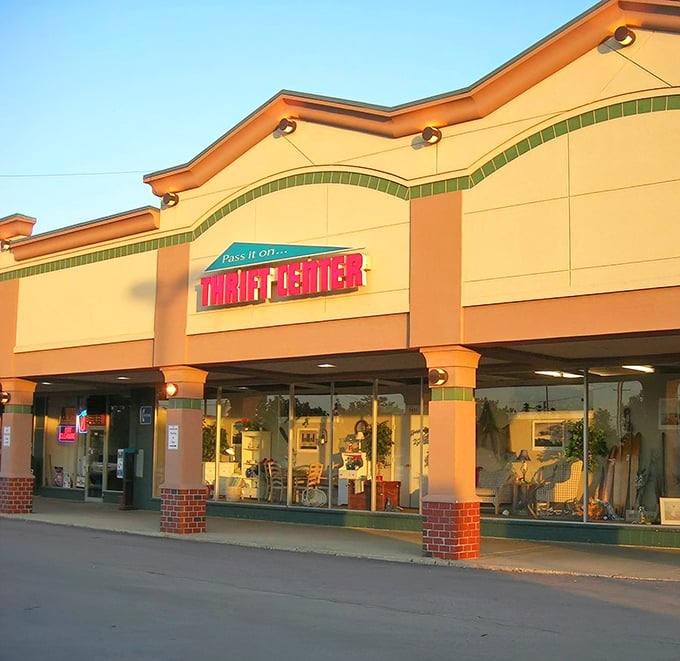 Pass It On Thrift Center's cheerful storefront promises treasures inside - like a garage sale that grew up and got organized.