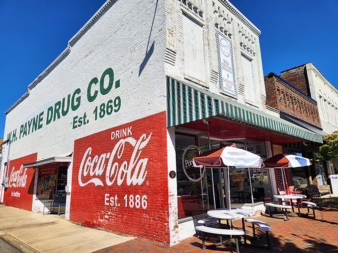 The iconic W.H. Payne Drug Co. building stands proud since 1869, where sandwich history meets small-town charm.