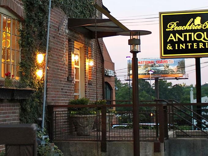 Evening lights transform this Atlanta antique haven into something magical, where treasures await discovery.